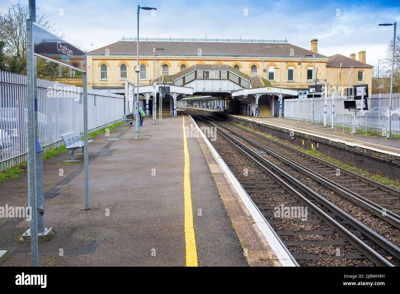 Passengers and trains at the platforms at Chatham railway station ...