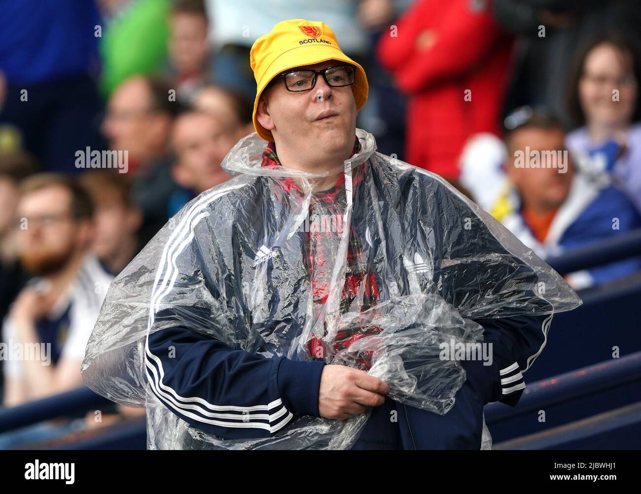 Football fan poncho hi-res stock photography and images - Alamy