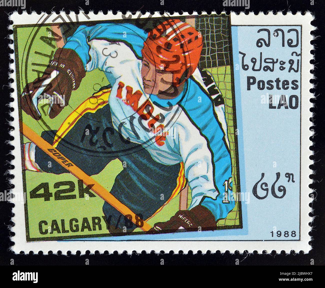 Cancelled postage stamp printed by Laos, that shows Hockey, promoting ...