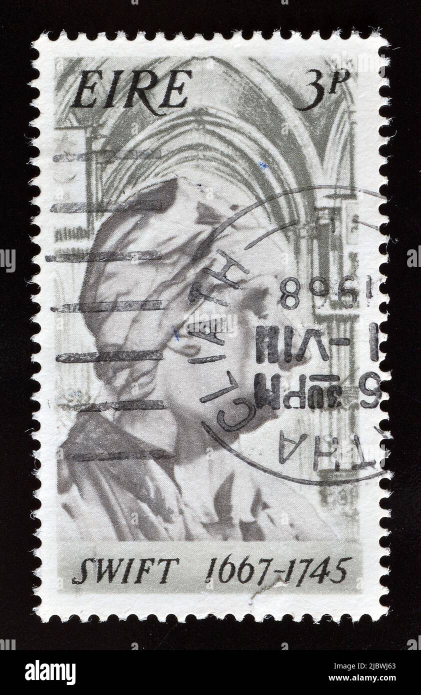 Cancelled postage stamp printed by Ireland, that shows Jonathan Swift ...