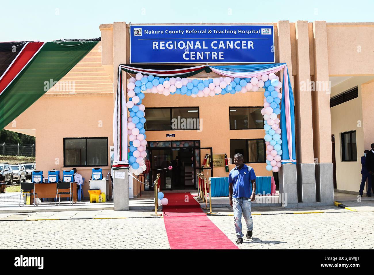 Nakuru, Kenya. 6th June, 2022. A man walks past the newly opened cancer ...