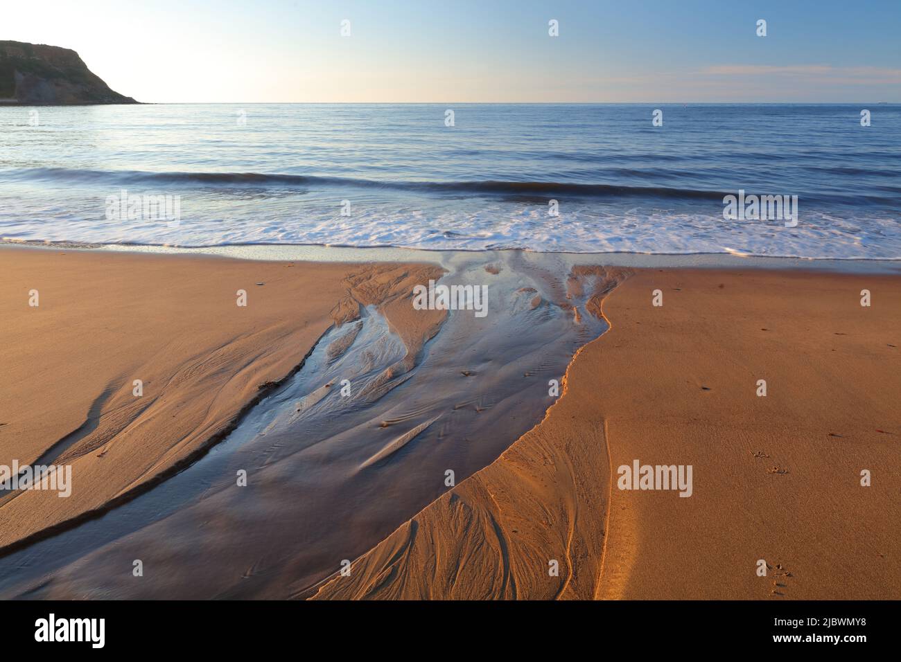 View of the North Sea with sand patterns in the foreground, Runswick ...
