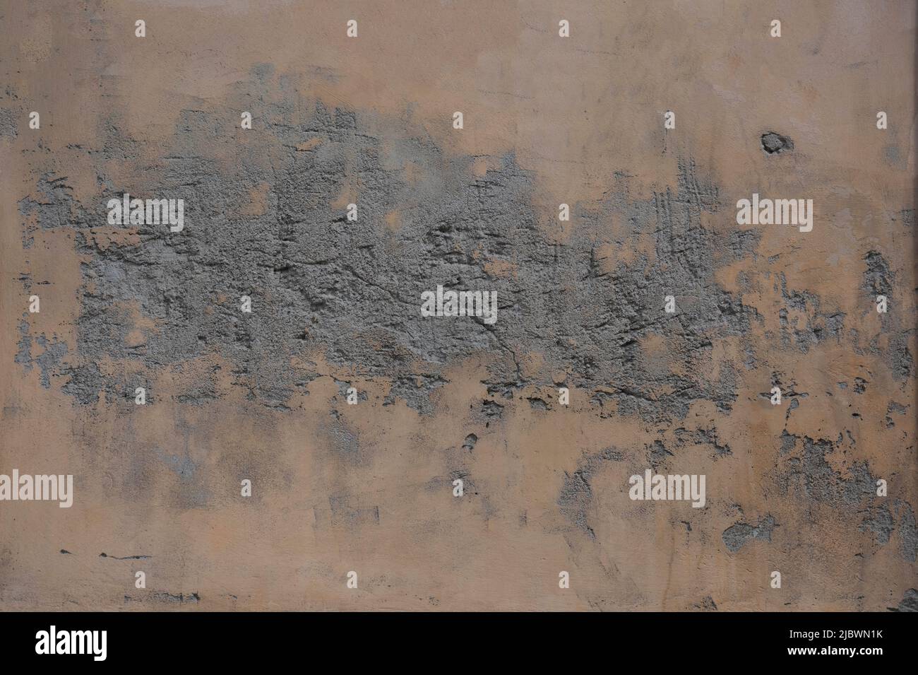 Rustic concrete orange house wall Stock Photo - Alamy