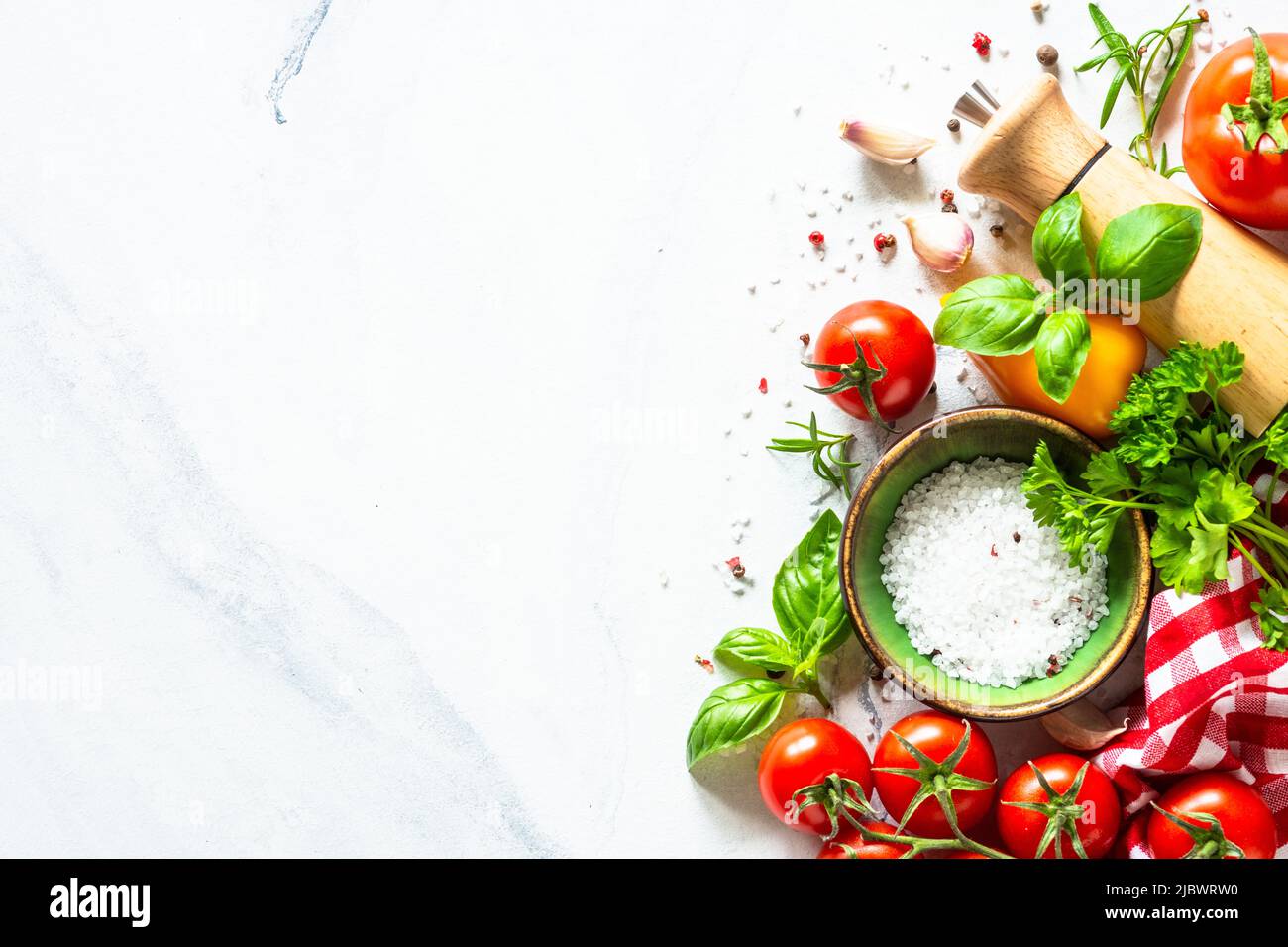Food cooking background on white marble table Stock Photo - Alamy