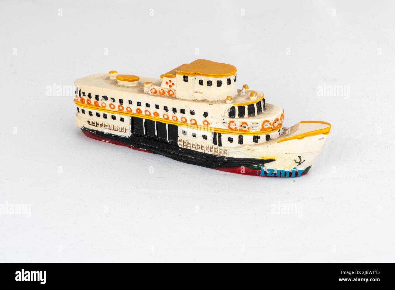 Cropped view of tiny ship toy shot with selective focus from opposite ...