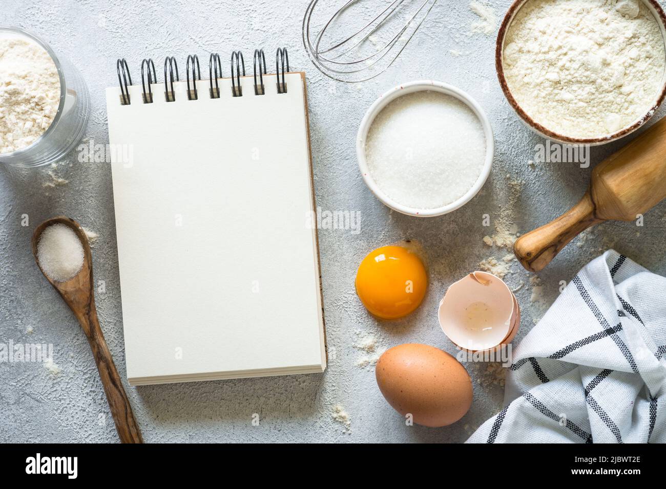 Baking background with cooking book and ingredients Stock Photo - Alamy