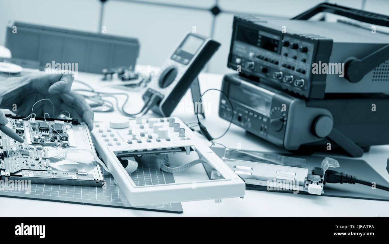Repair of computer parts in a customer service laboratory Stock Photo ...