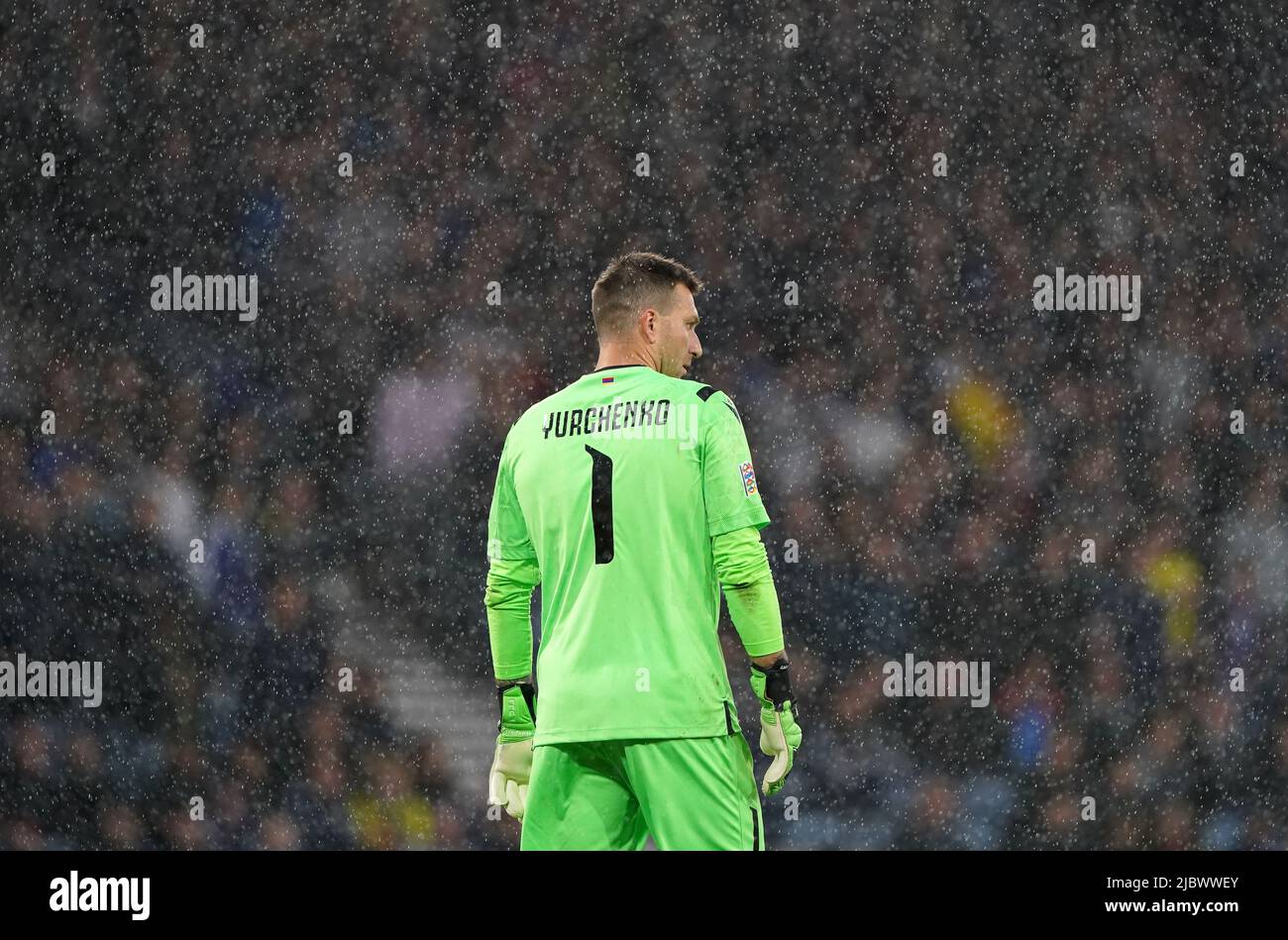 Armenia goalkeeper David Yurchenko standing in the rain during the UEFA ...