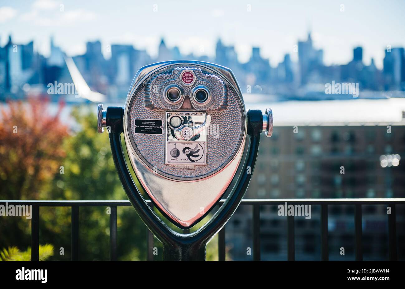 Coin operated binoculars pointed towards manhattan Stock Photo - Alamy