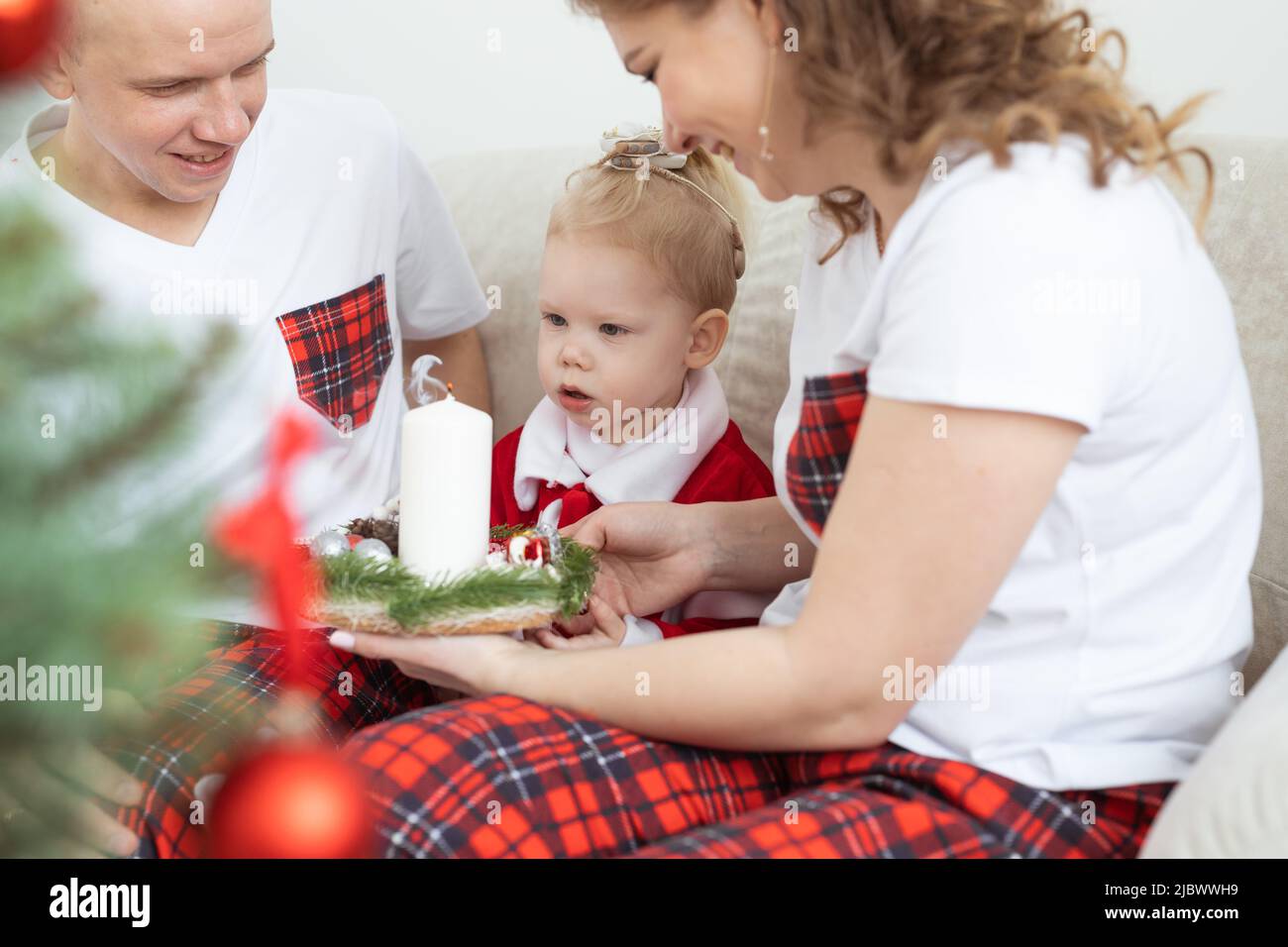 Baby child with hearing aid and cochlear implant having fun with ...