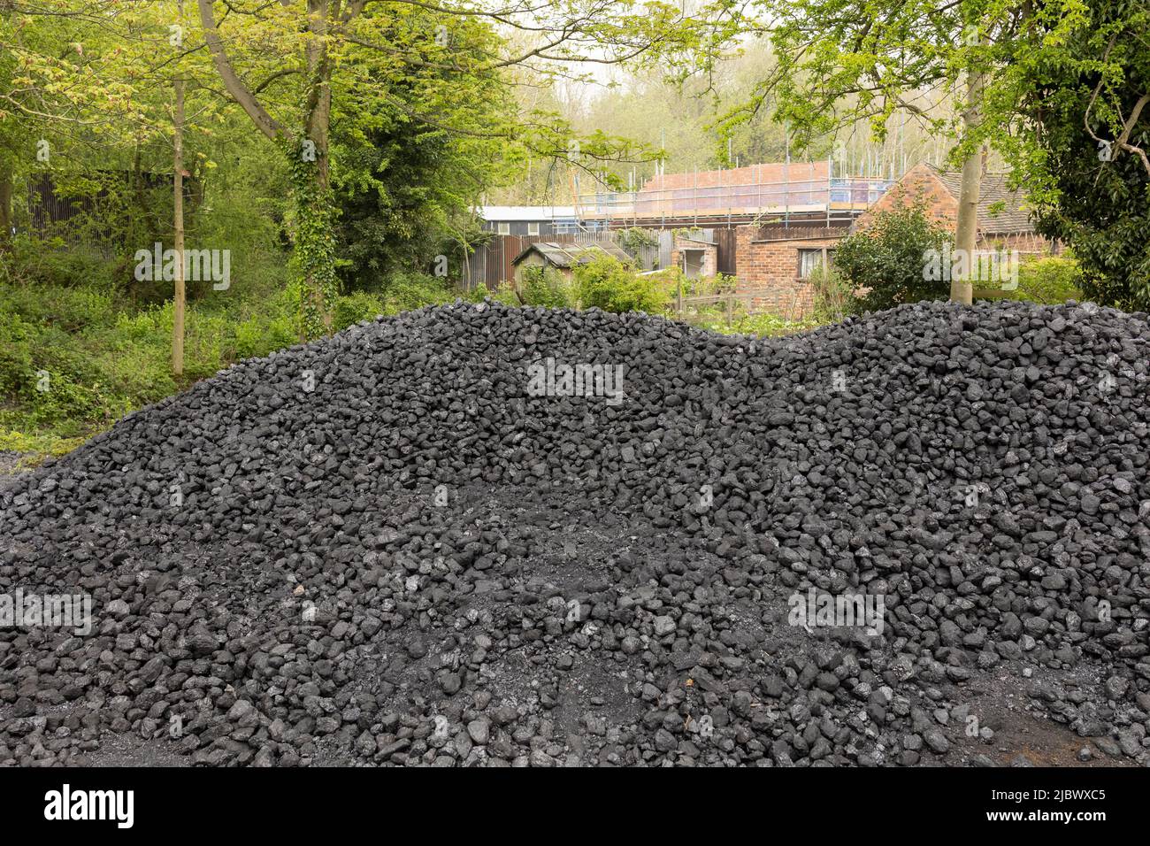 piles of coal stored ready to be sold Stock Photo - Alamy