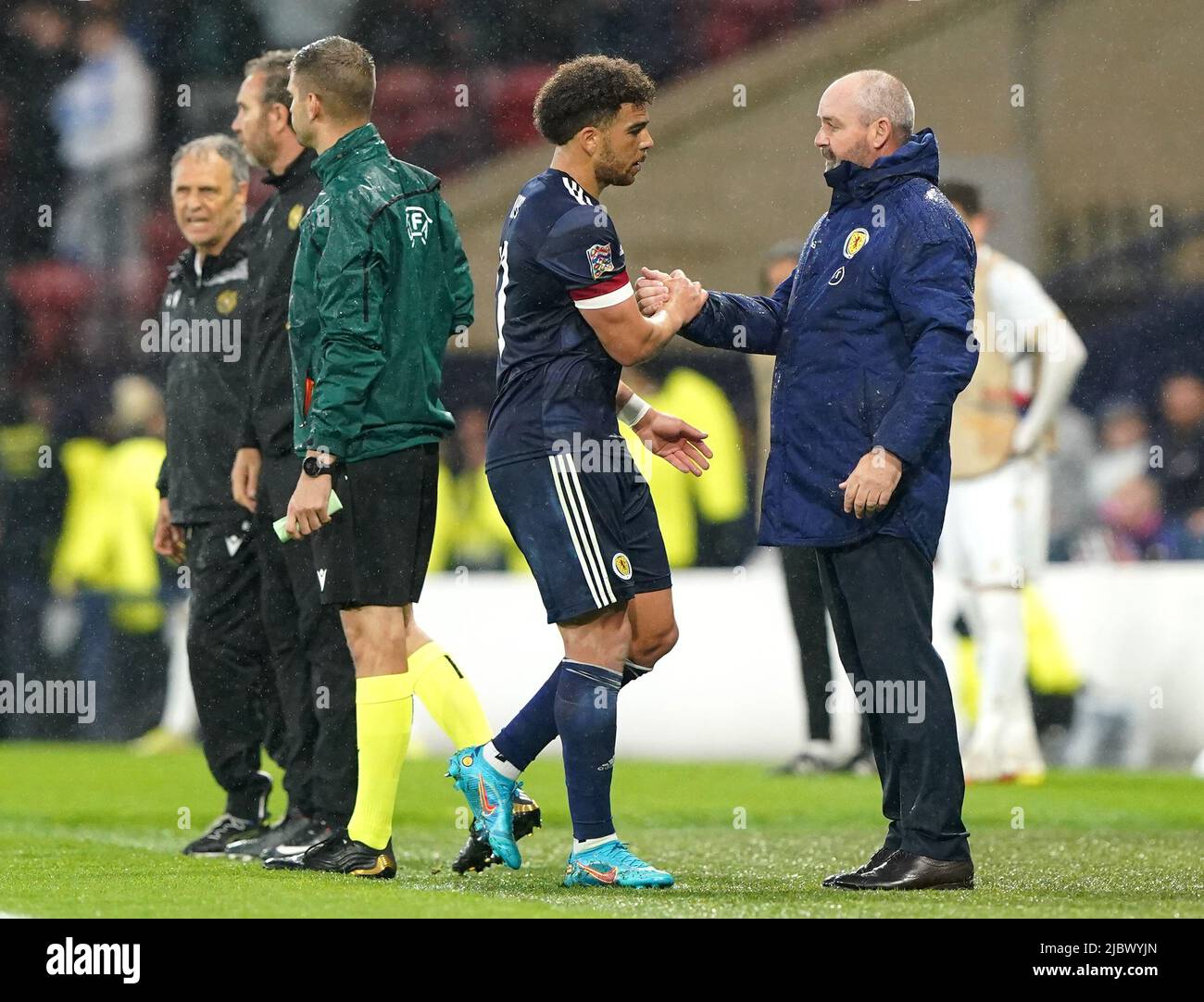 Scotland's Che Adams greets manager Steve Clarke after being ...