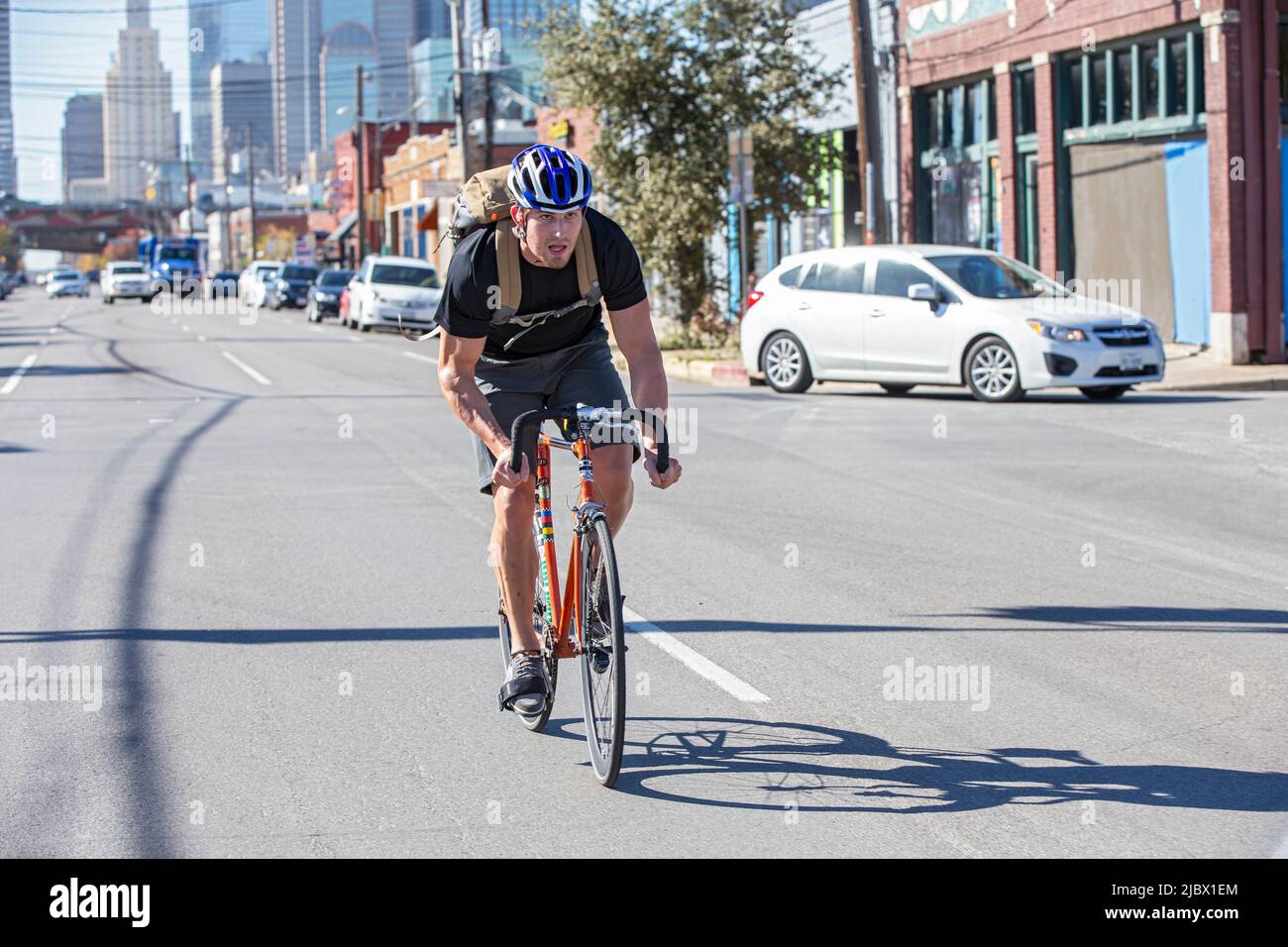 Bike Messenger out on the road for a delivery Stock Photo - Alamy