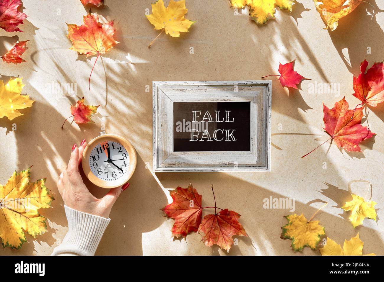 Time change in Autumn. Text Fall Back on blackboard, chalk board ...