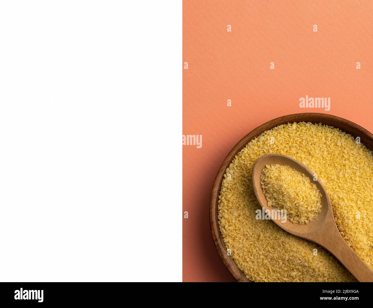 Japanese Panko bread in crumbs in yellow version - Wooden bowl Stock ...