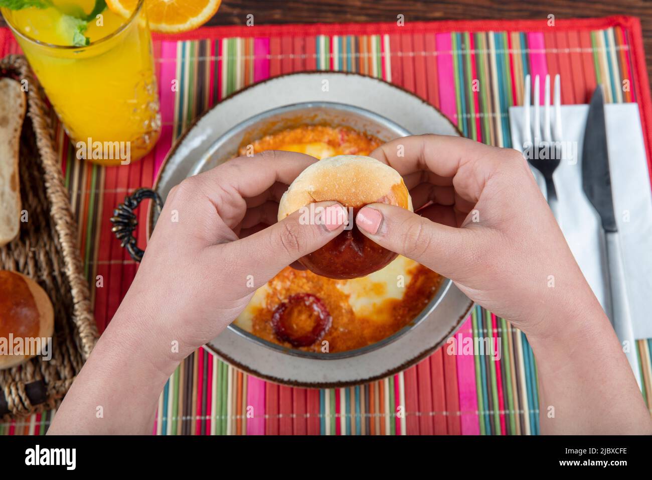 Traditional turkish food menemen, made by eggs, sausage (sucuk) and ...
