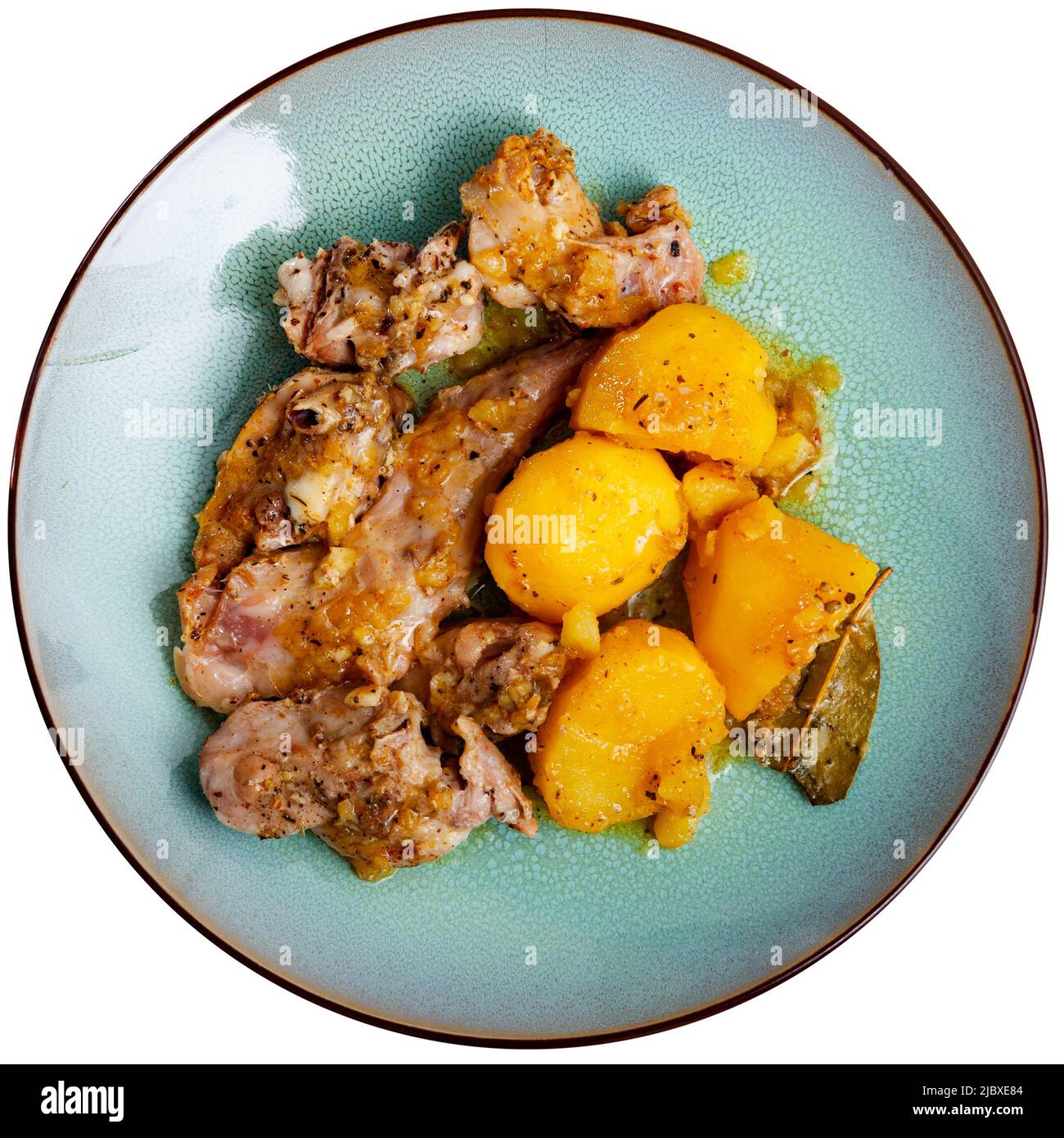 Dish of stewed rabbit and potatoes Stock Photo - Alamy