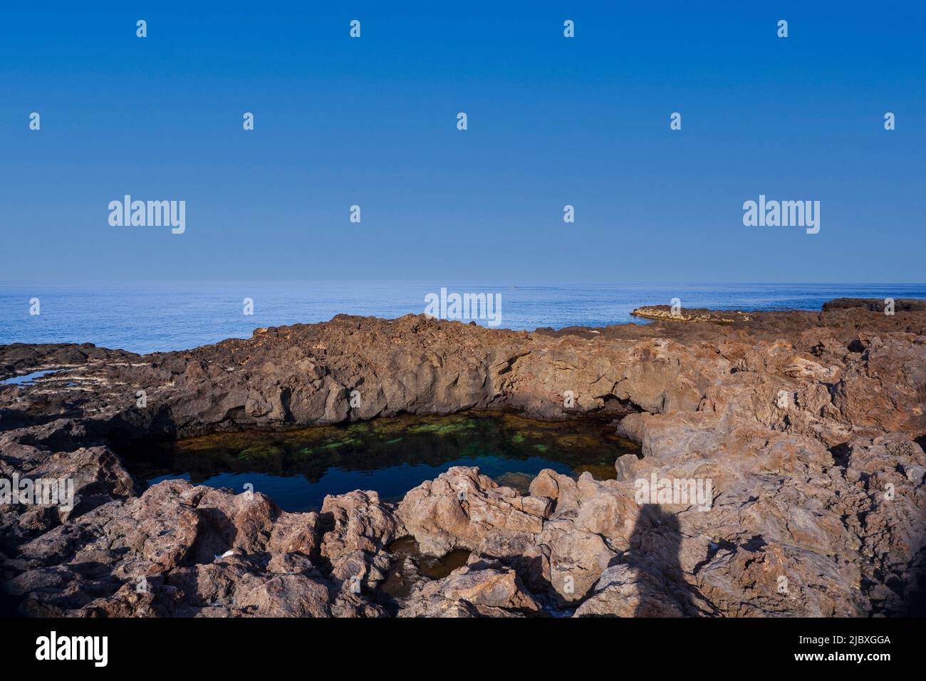View of the lava beach of Linosa Called Piscine, Sicily. Italy Stock ...