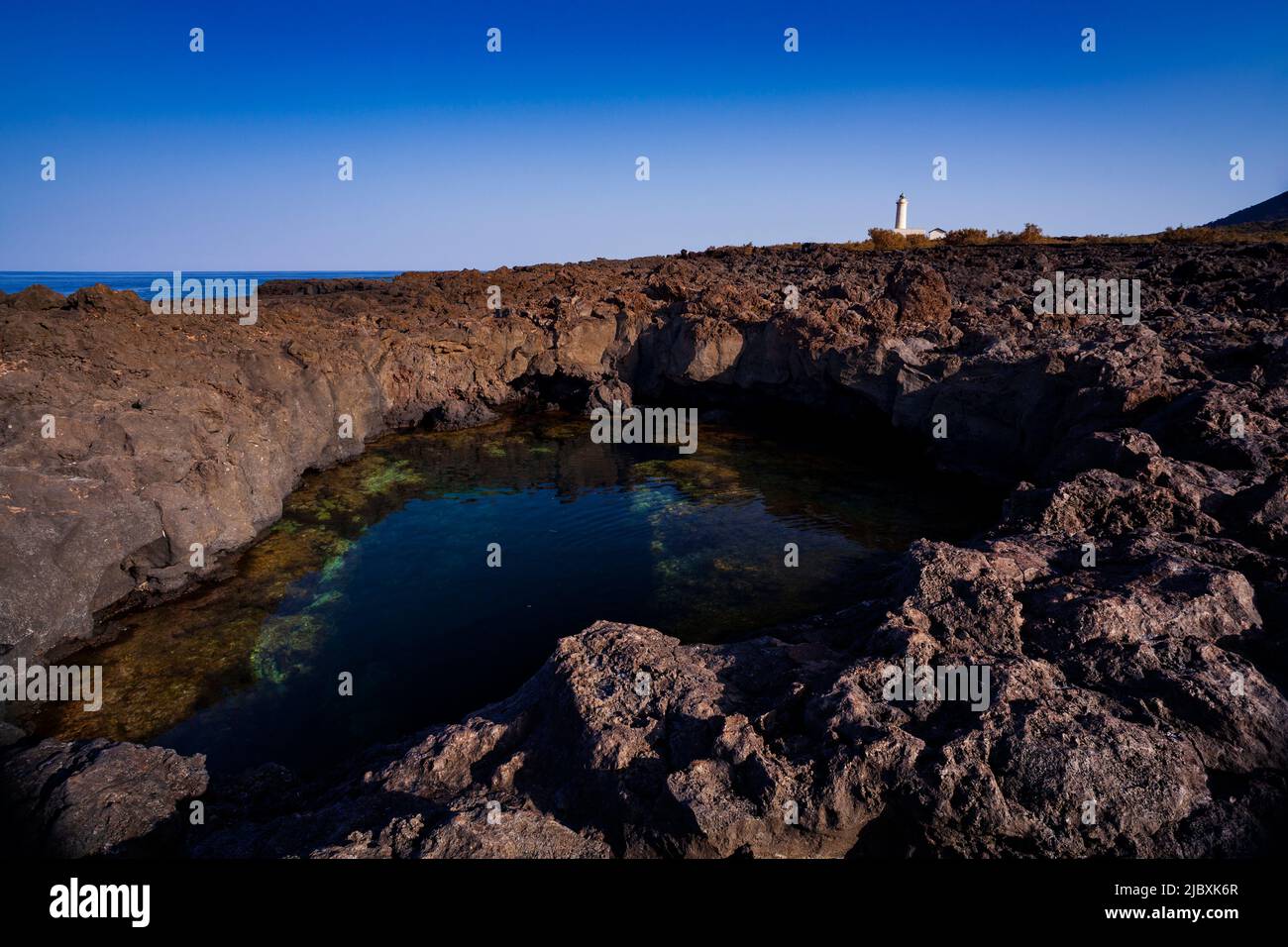 View of the lava beach of Linosa Called Piscine, Sicily. Italy Stock ...