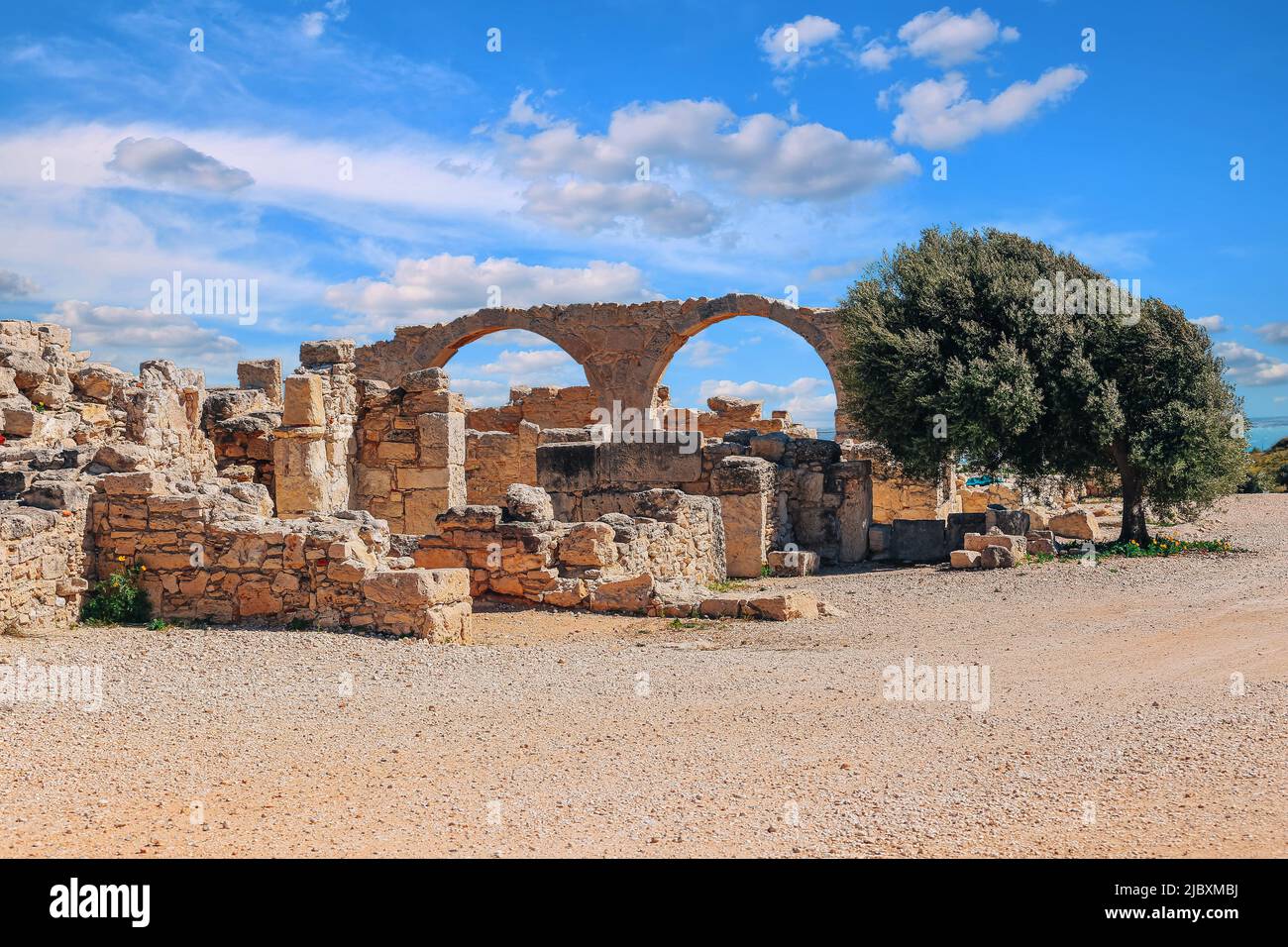 View of the ruins and arches of the ancient Greek city Kourion ...