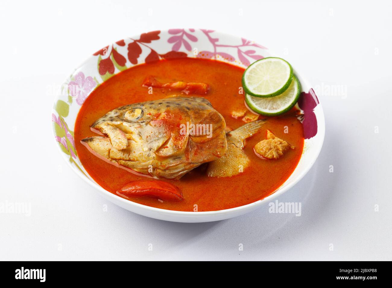 Delicious King Fish Head Sweet and Sour Curry Cooked with Tomato, Lime ...