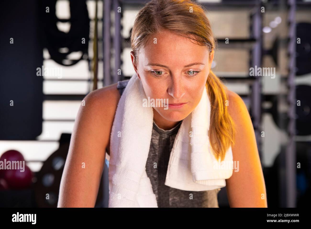 Woman resting in gym hi-res stock photography and images - Alamy