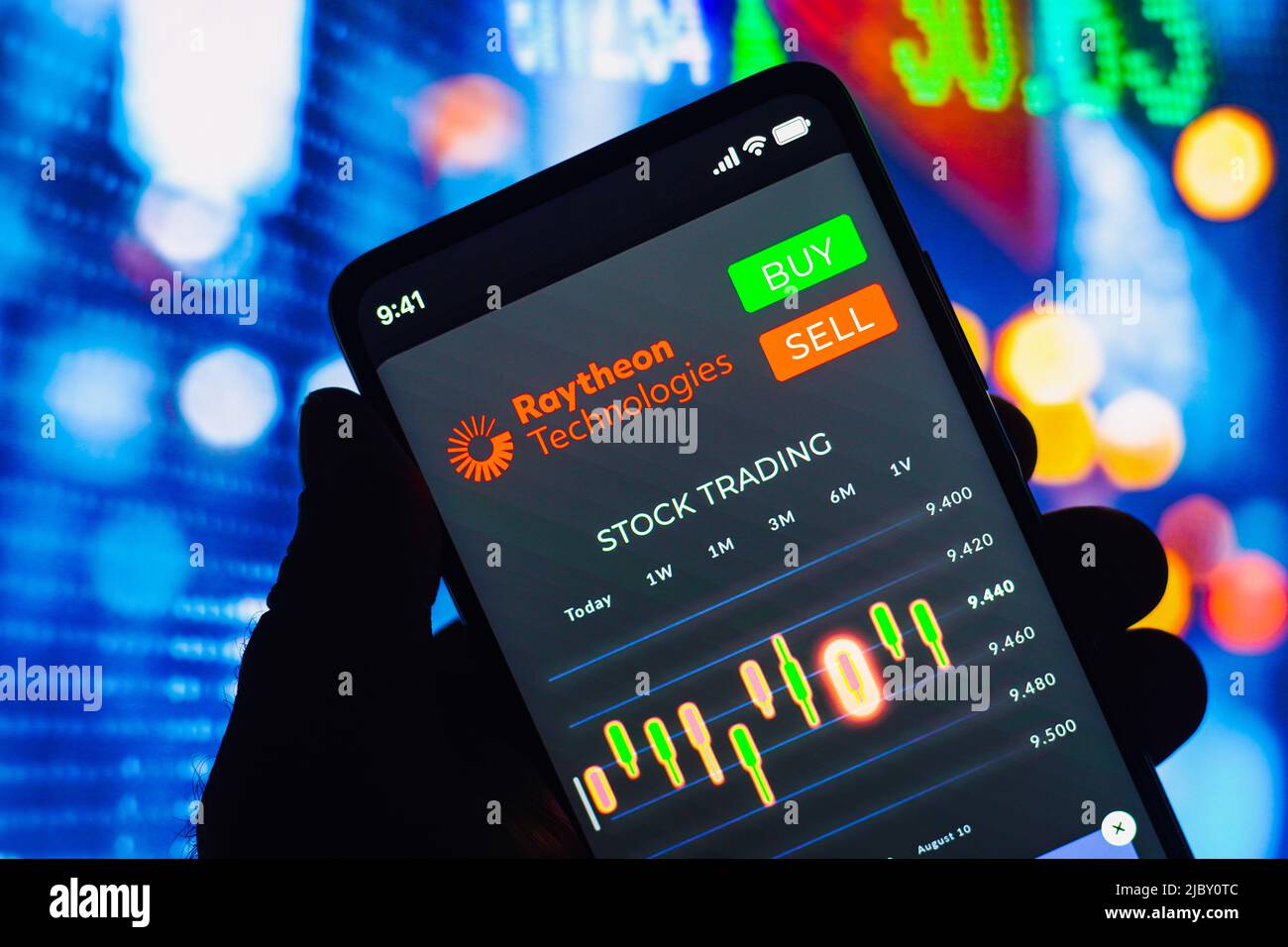 In this photo illustration, the stock trading graph of Raytheon ...