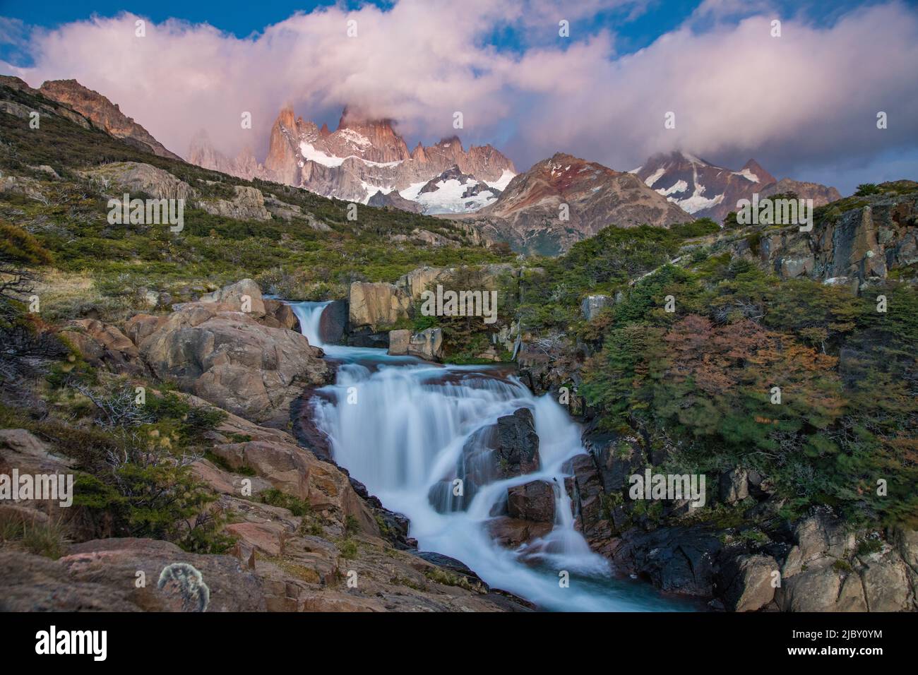 Waterfall in front and Fitz Roy mountain. Patagonia, Argentina Stock ...