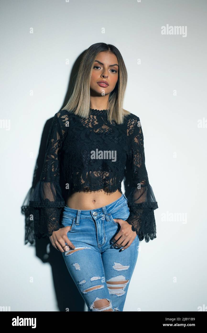 Beautiful woman in blue top hi-res stock photography and images - Alamy