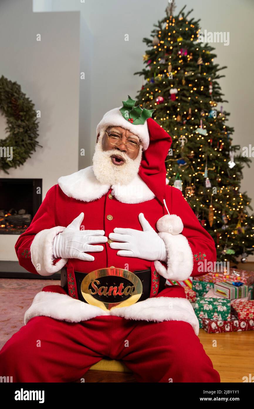 A jolly Santa Claus Ho-ho-hoing and laughing Stock Photo - Alamy