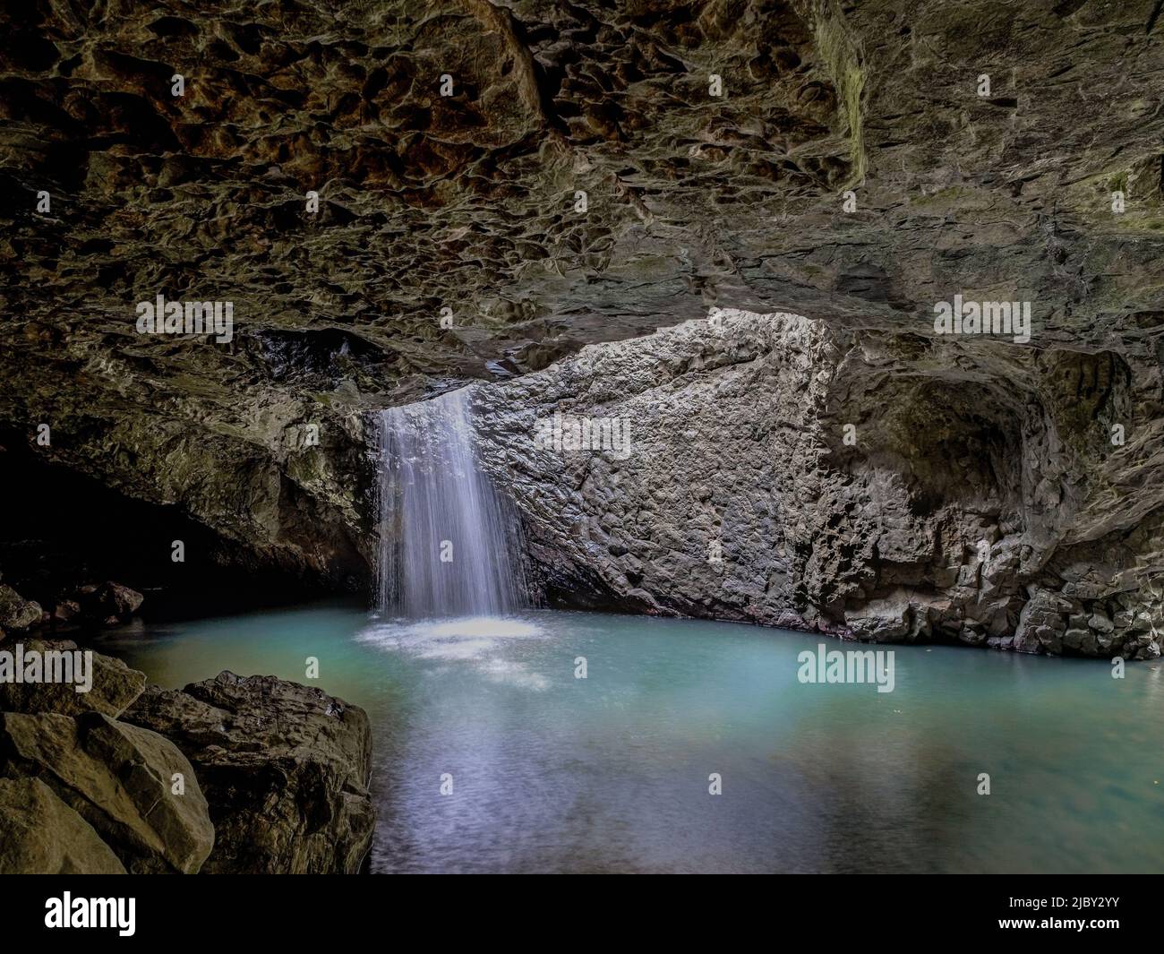 Water flowing into pool at the Natural Bridge in the Gondwana ...