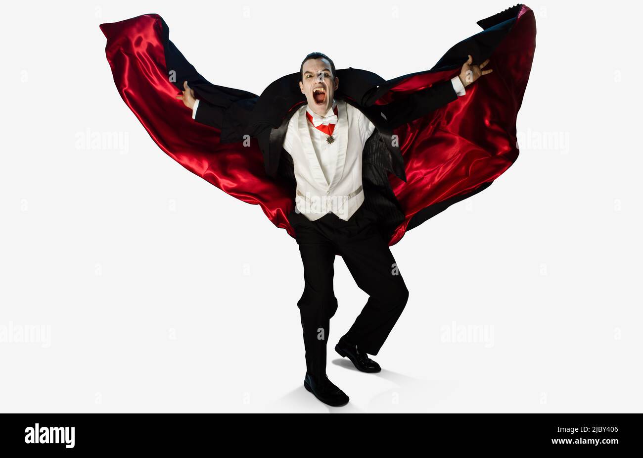 Themed portrait of a vampire on a white background lunging towards ...