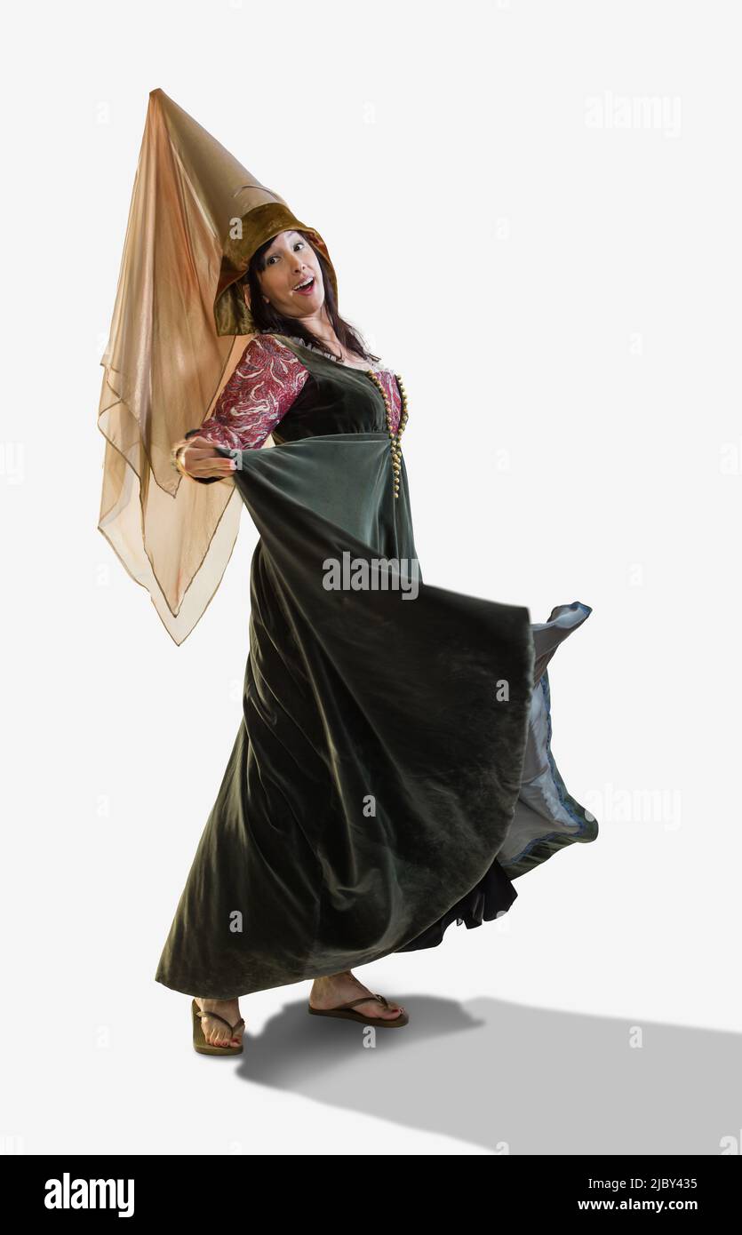Full length portrait of a medieval Princess dancing and turning in ...