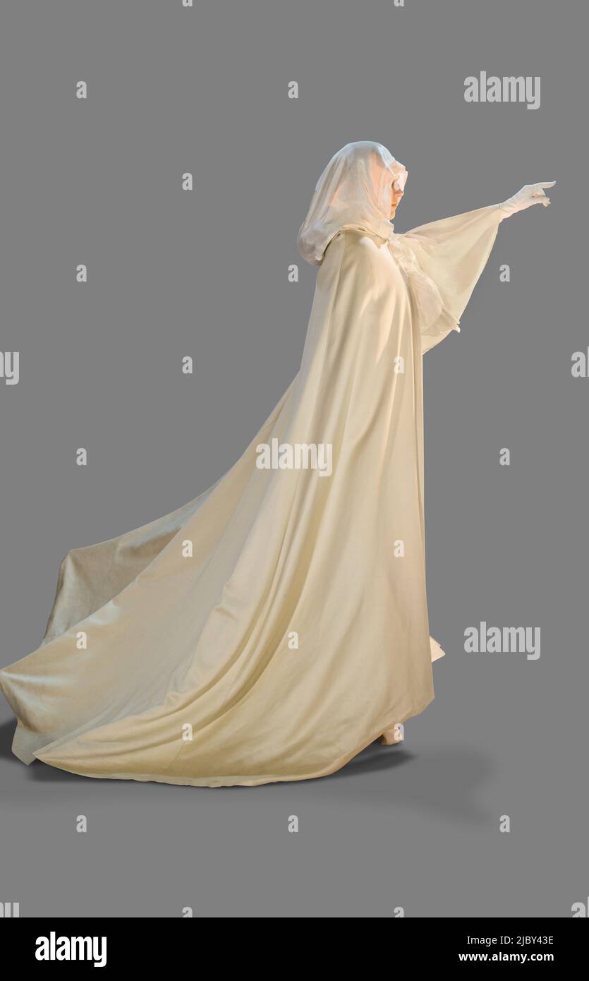 Portrait of a woman dressed as a ghost for Halloween turned profile ...