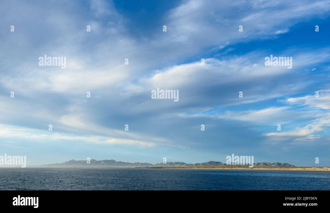 Blue skies over Isla Magdalena and Magdalena Bay at sunrise Stock Photo ...