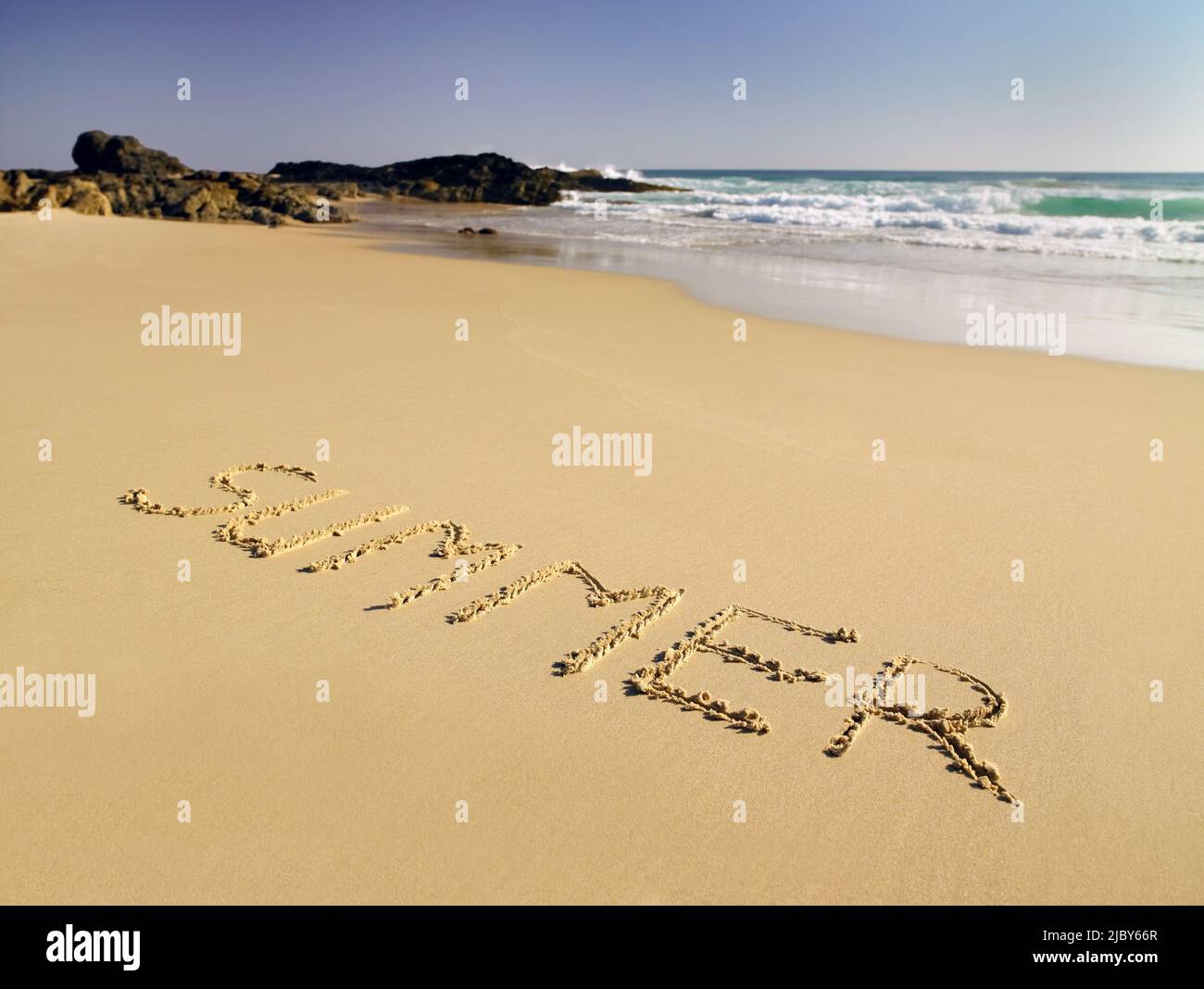 Word ocean on sand beach hi-res stock photography and images - Alamy