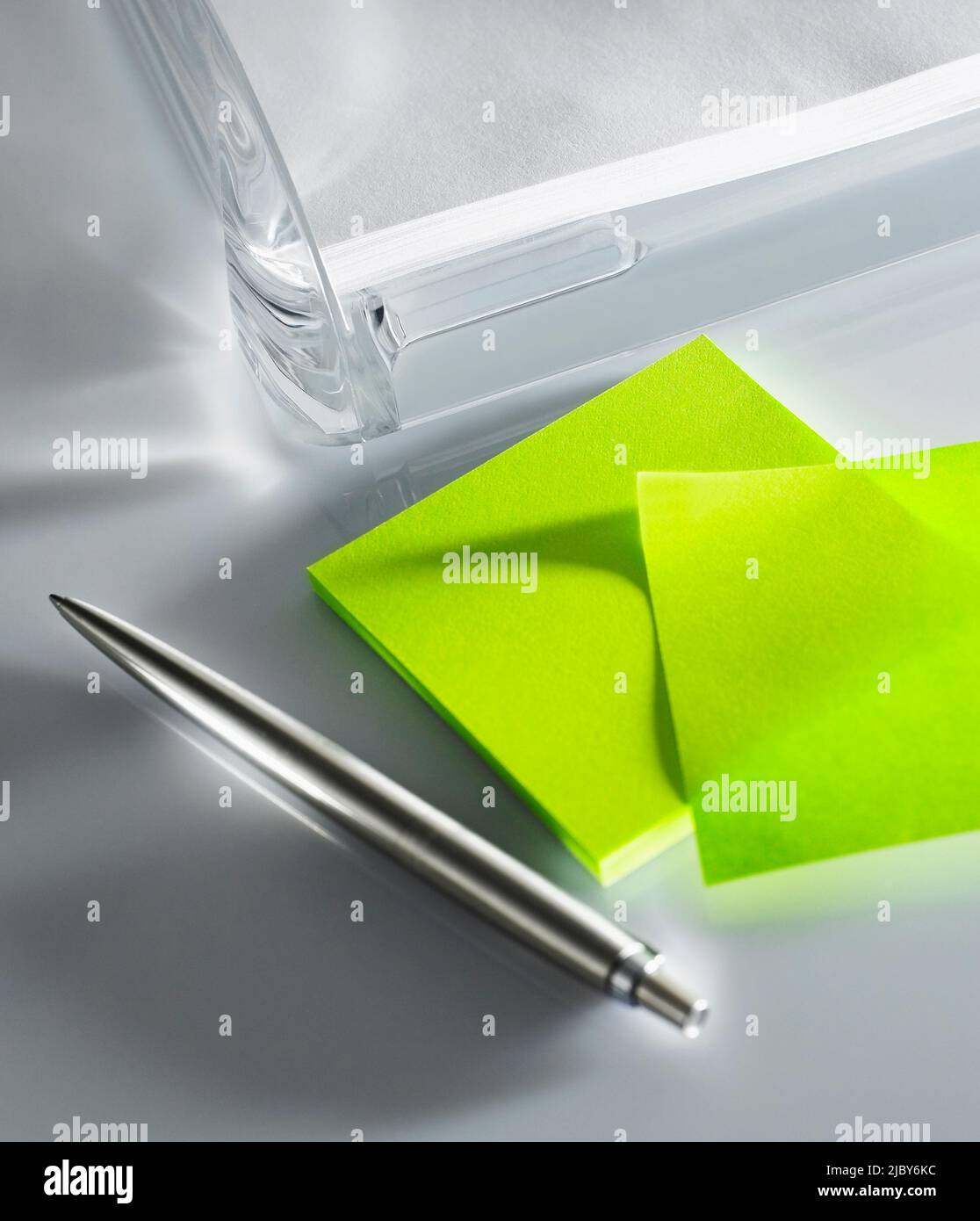 Pen, blank paper and adhesive notes on desk Stock Photo - Alamy