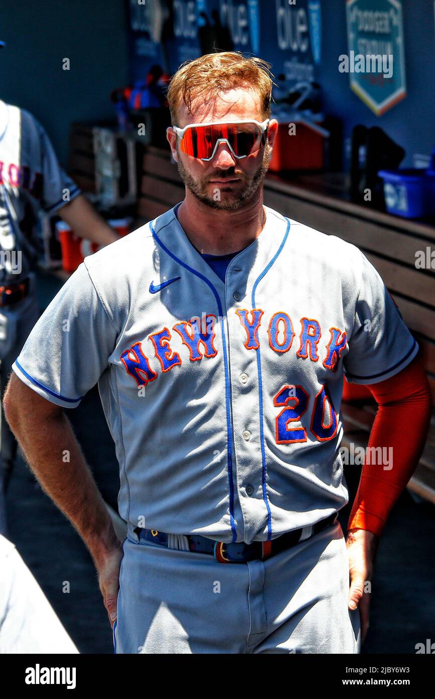New York Mets first baseman Pete Alonso (20) watches from the dugout ...