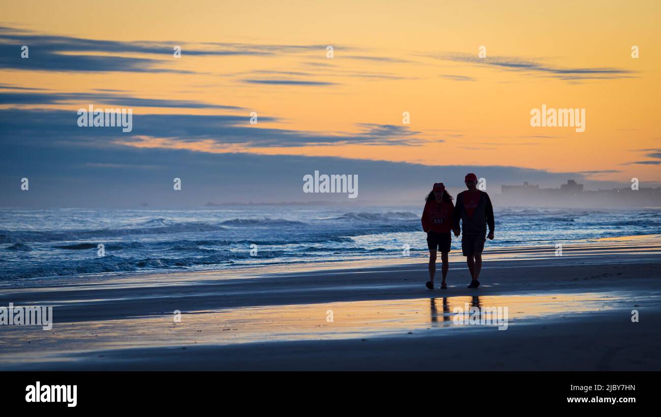 Evening beach walk Stock Photo - Alamy