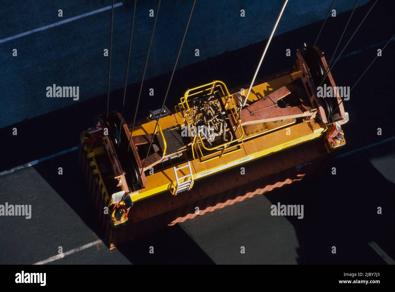 Looking from top of crane down at securred shipping container ready for ...
