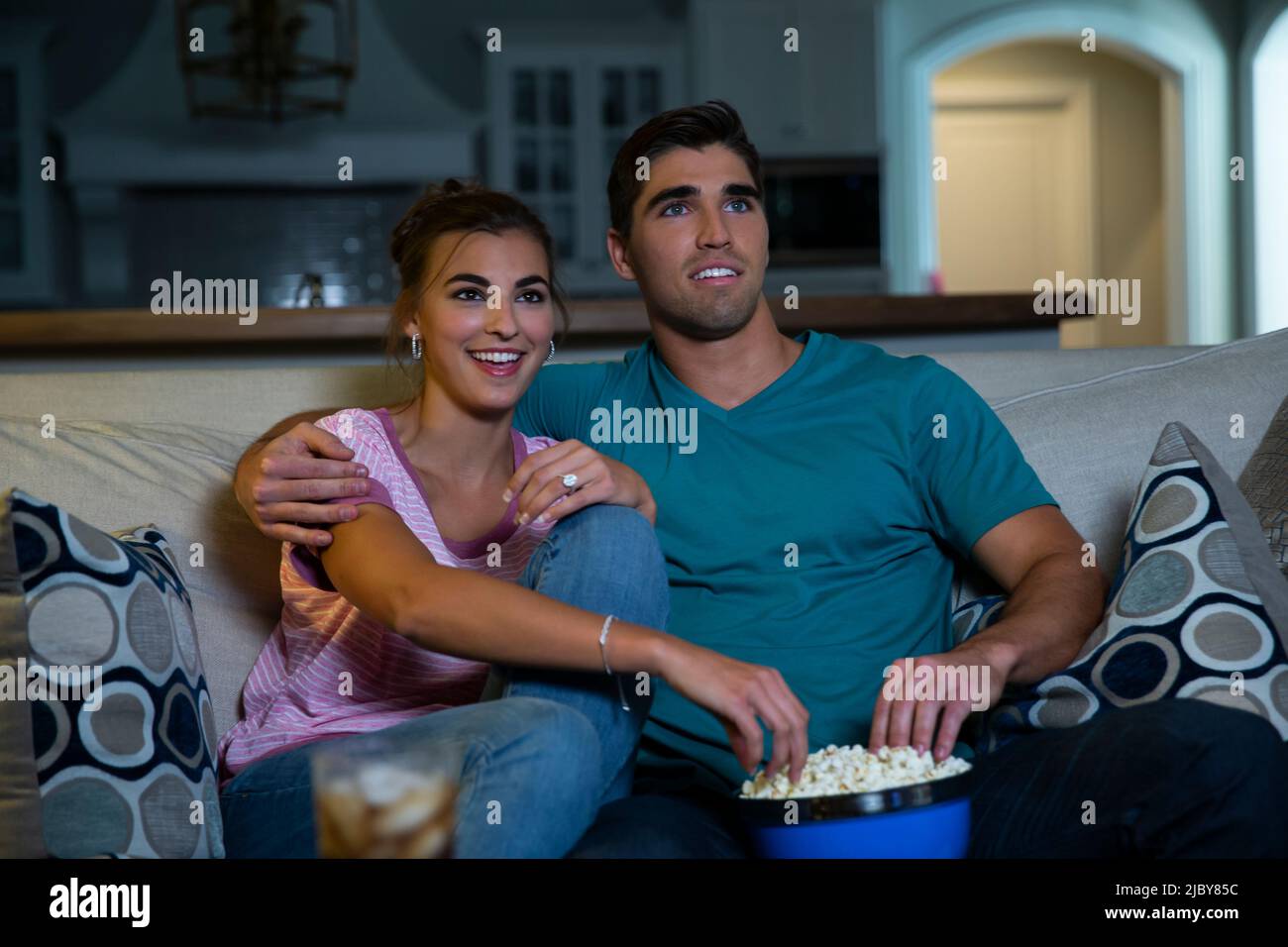 Watching netflix sofa hi-res stock photography and images - Alamy