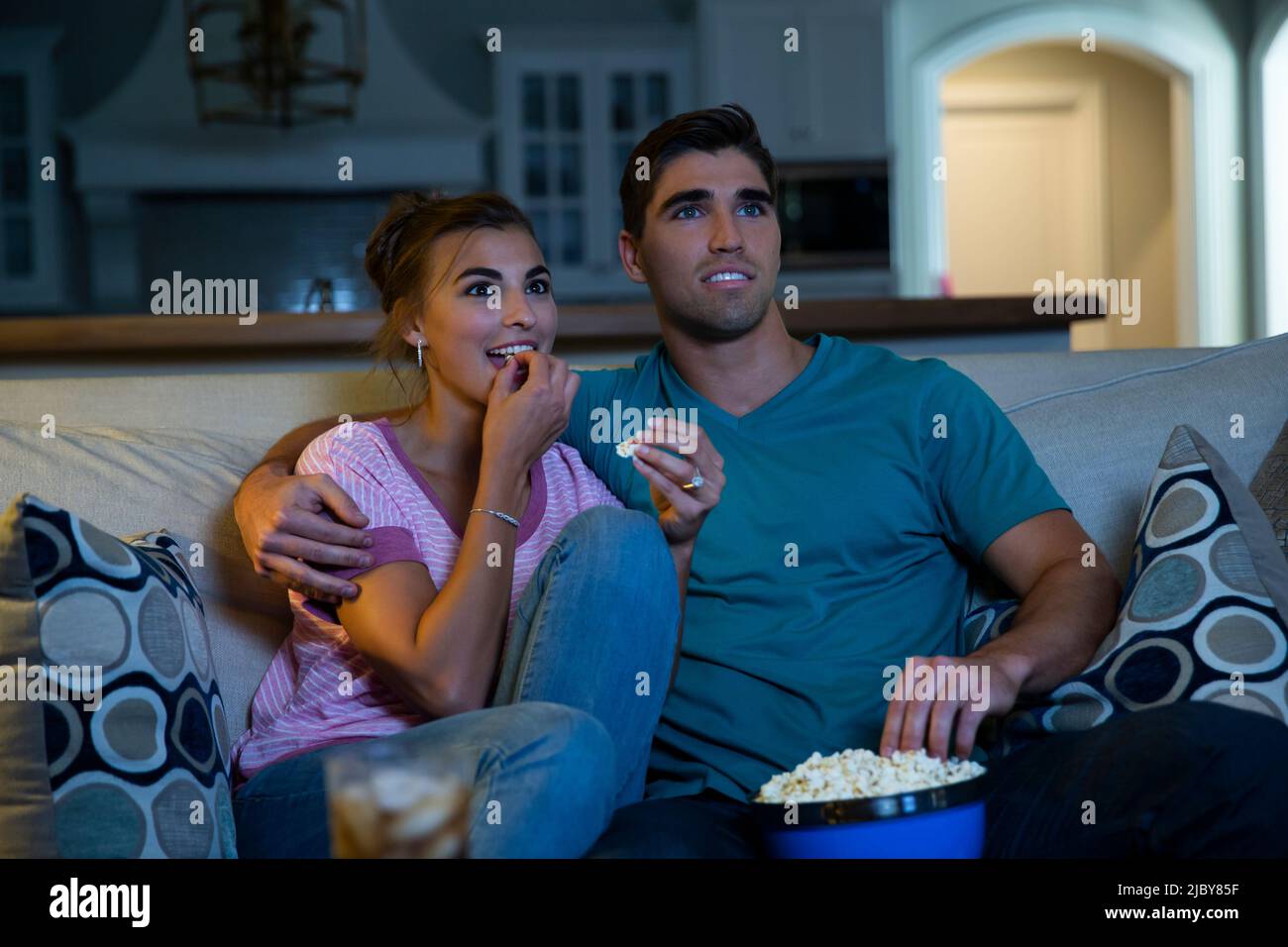 Watching netflix sofa hi-res stock photography and images - Alamy
