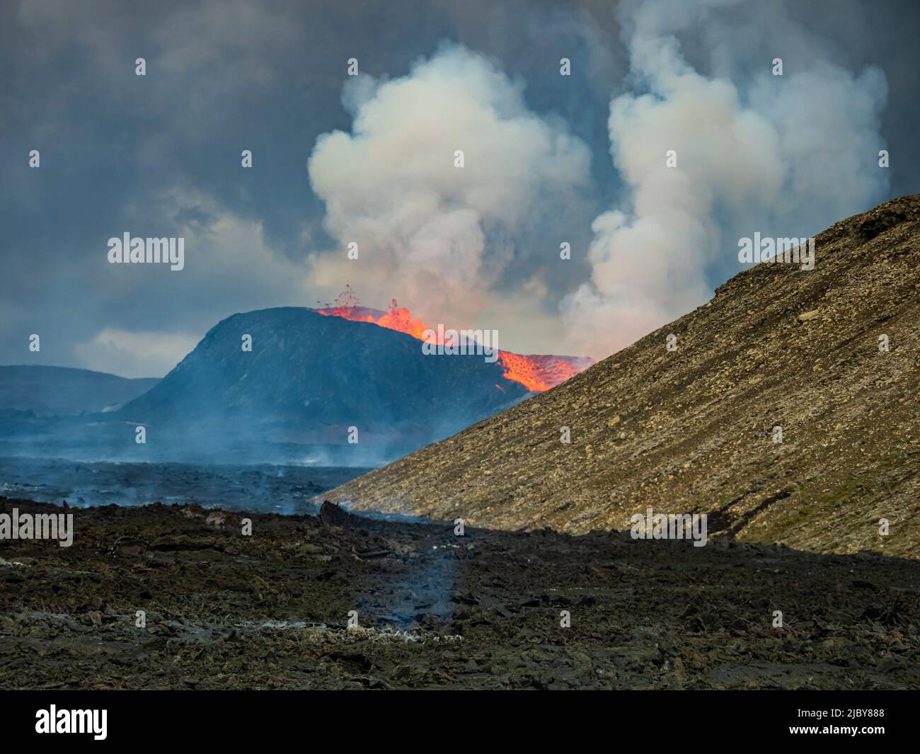 Lava lake filling valley around Fagradalsfjall Volcano, Iceland Stock ...