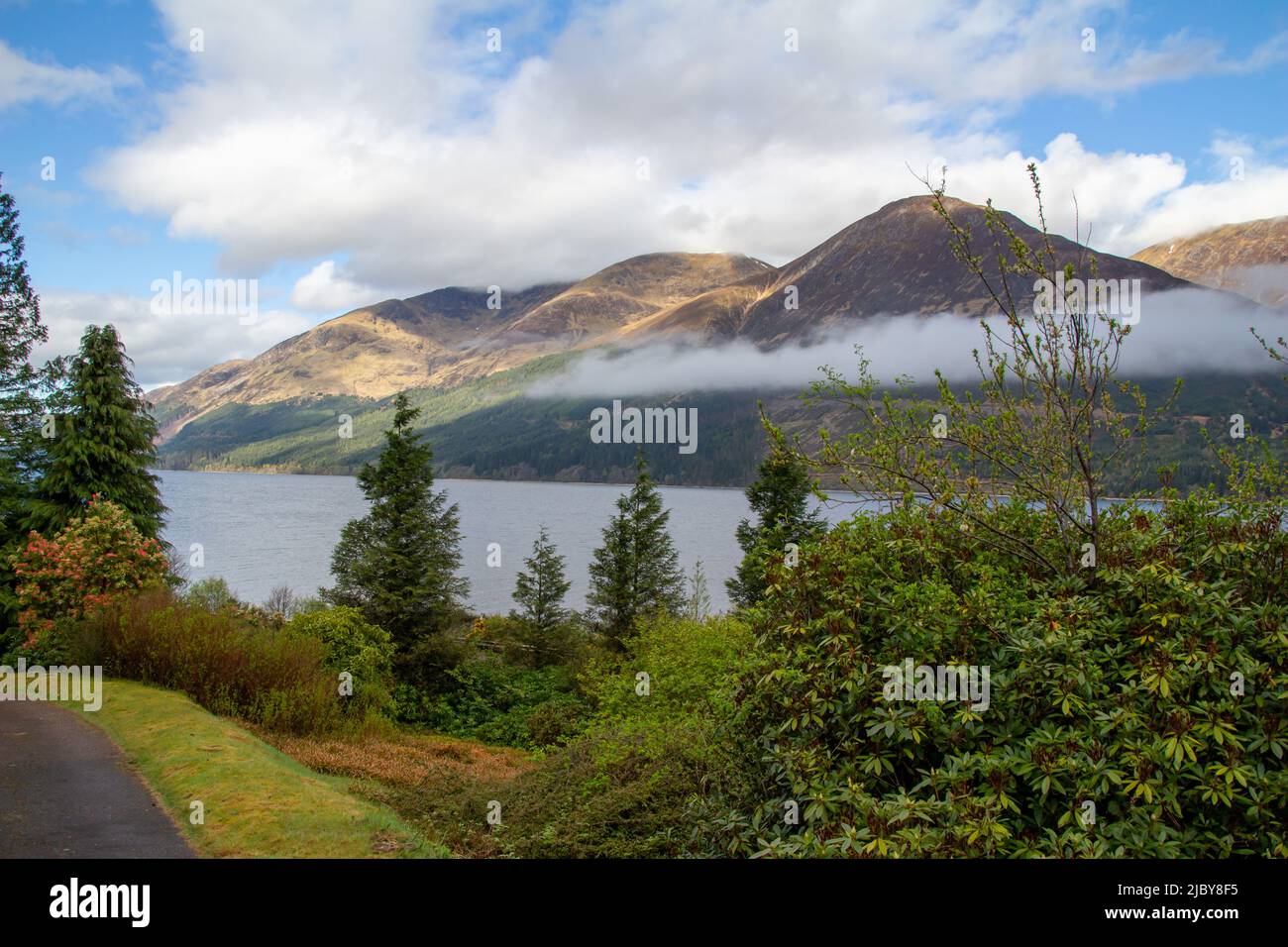 Beautiful scenic landscape of the Scottish highlands and a loch, with ...