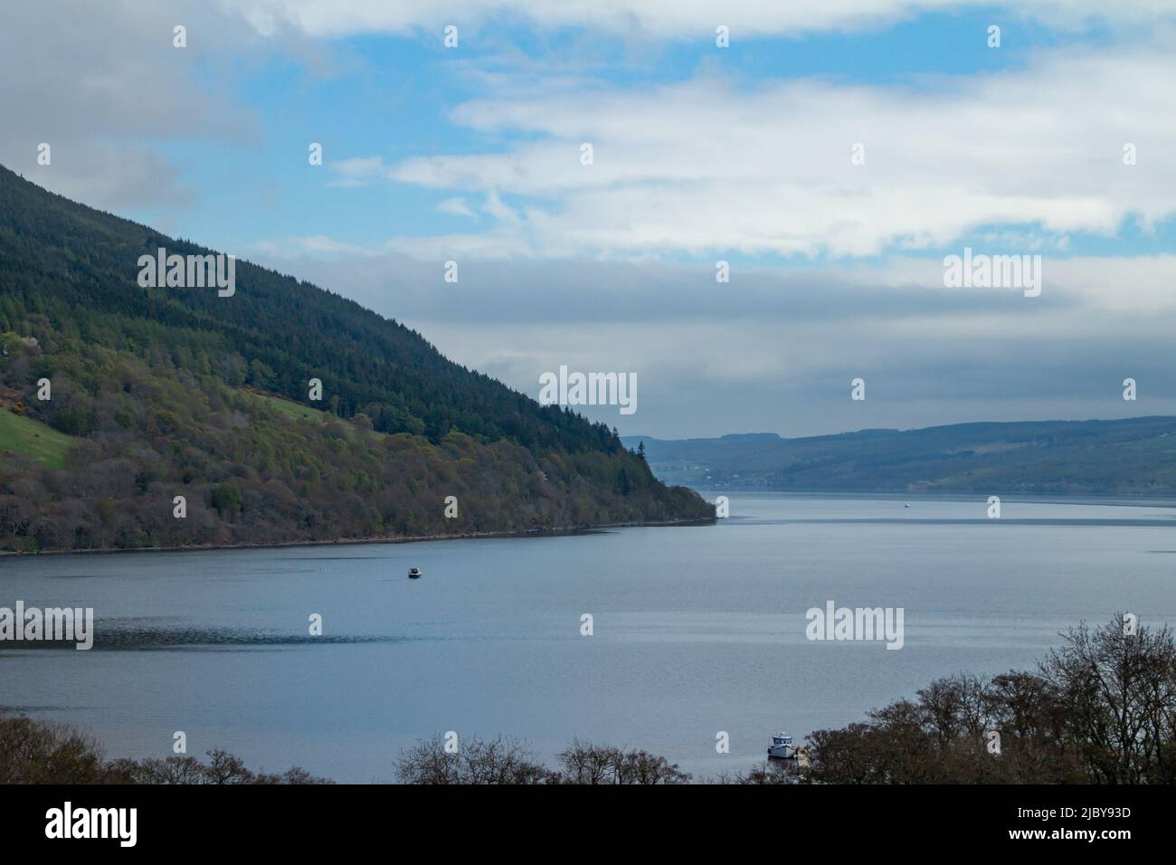 Scenic landscape view of Loch Ness in Scotland with highlands and blue ...