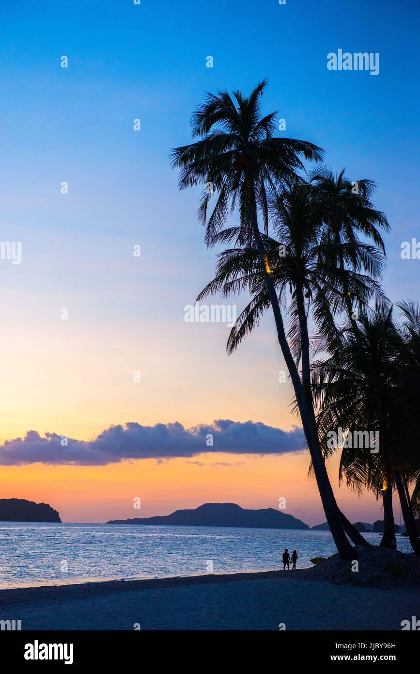 Philippines sunset beach walk Stock Photo - Alamy