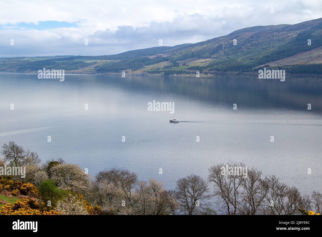 Scenic landscape view of Loch Ness in Scotland with highlands and blue ...