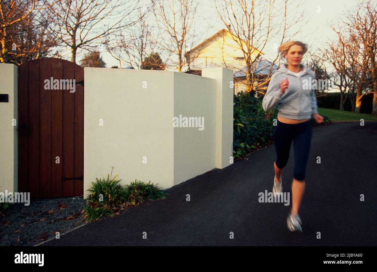 Woman leaving house and exercise hi-res stock photography and images ...