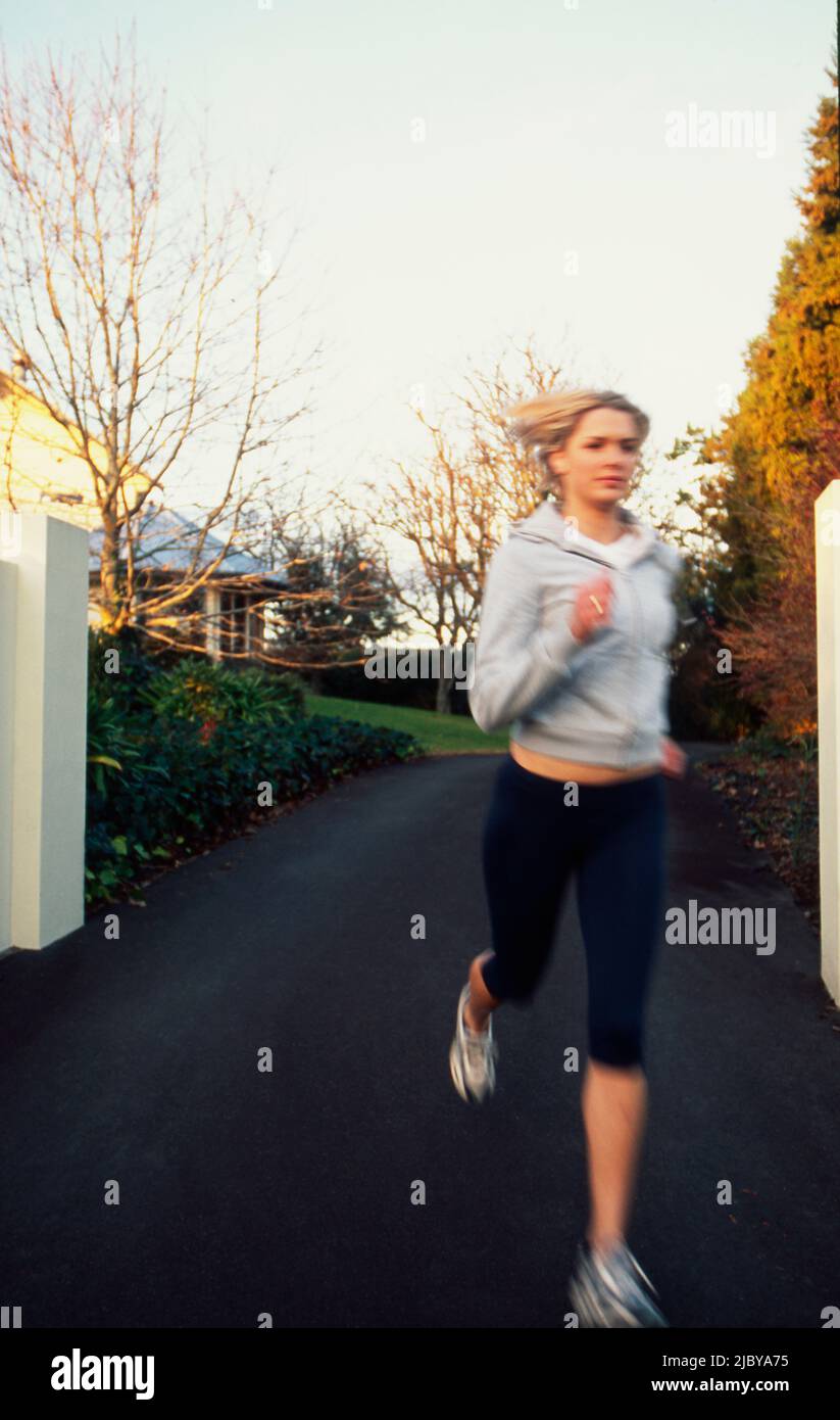 Woman leaving house and exercise hi-res stock photography and images ...