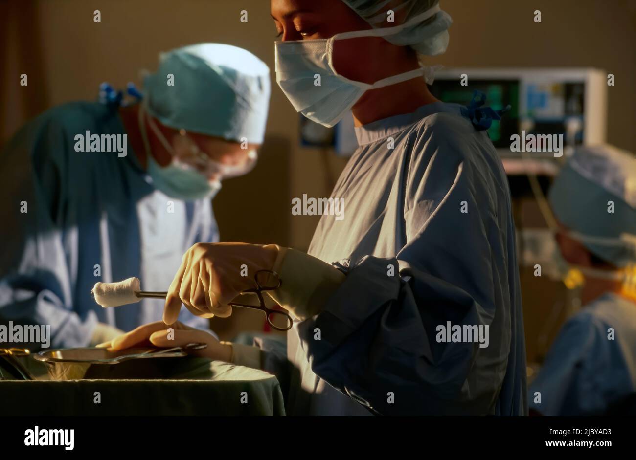 Nurses assisting doctor in theatre of hospital with operation Stock ...